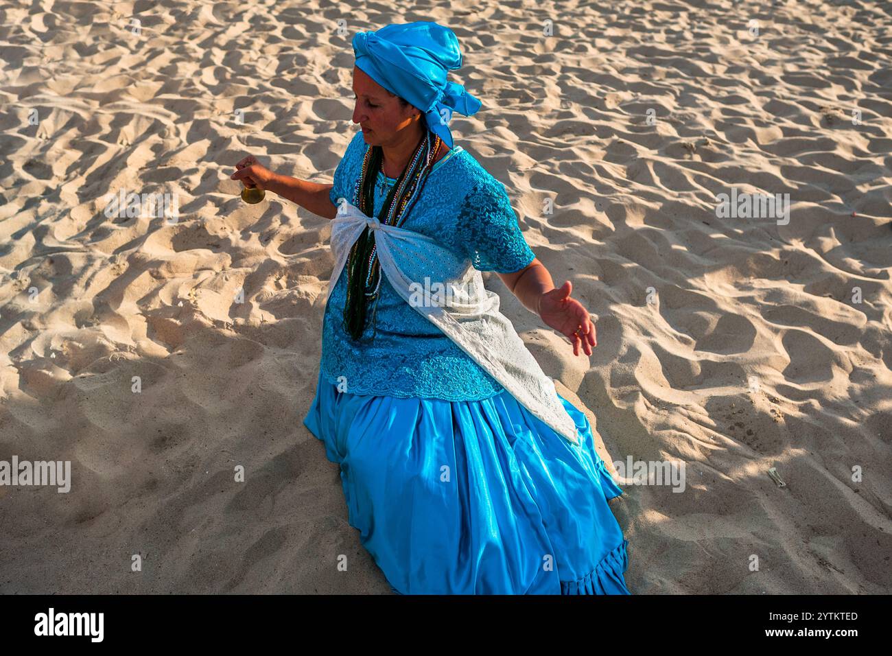 A worshiper of Umbanda, the Afro-Uruguayan religious cult, performs a ...