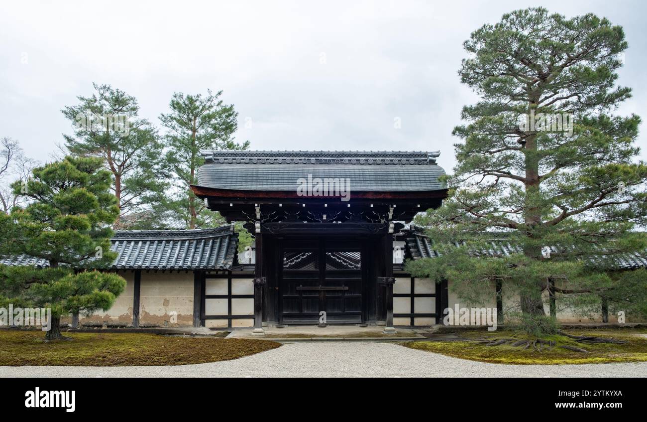 Entrance gate of a traditional japanese shrine, Japan. Tiled roof ...