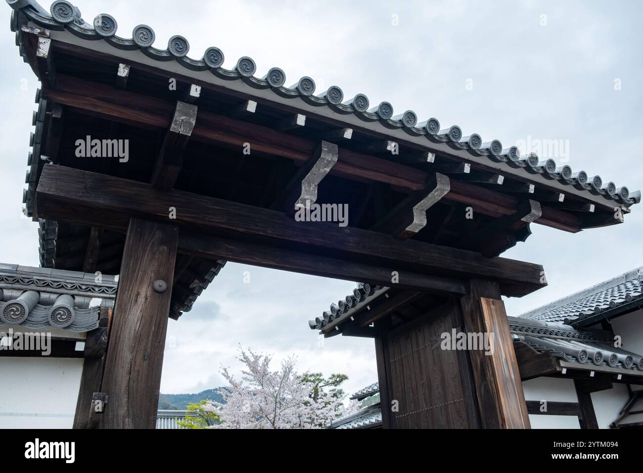 Entrance gate of a traditional japanese temple, Japan. Tiled roof ...