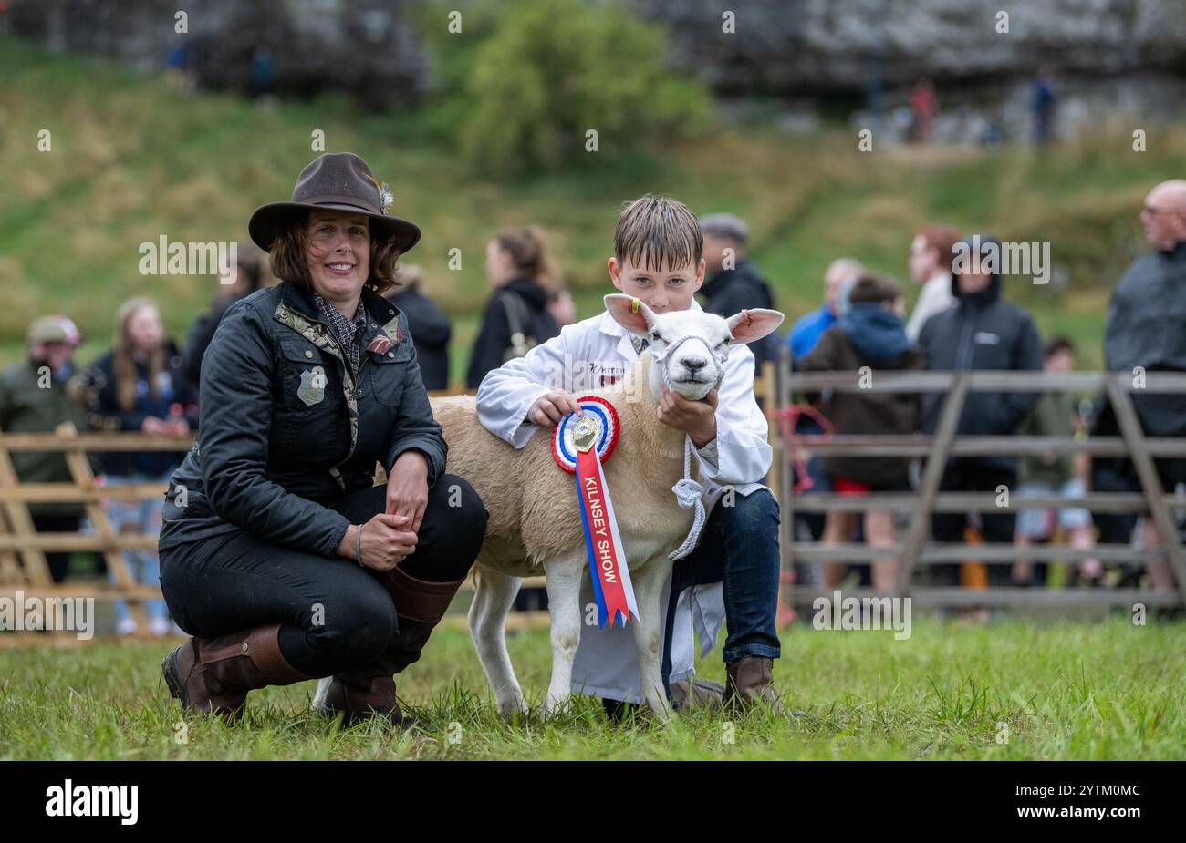 Sheep being shown at the 2024 Kilnsey Show under the shadow of Kilnsey ...