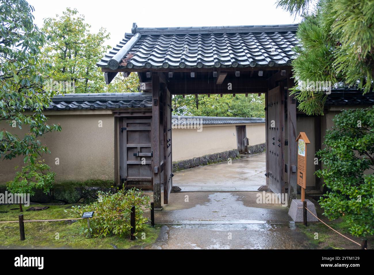 Entrance gate of a traditional japanese temple, Japan. Tiled roof ...