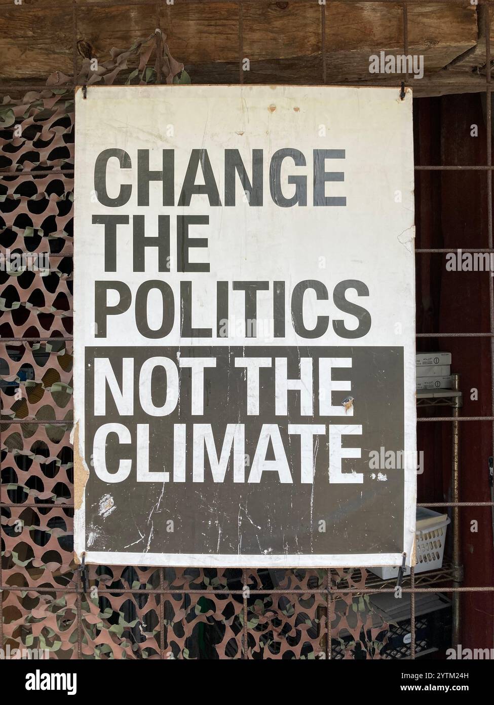 A sign saying Change the Politics not the Climate Stock Photo - Alamy