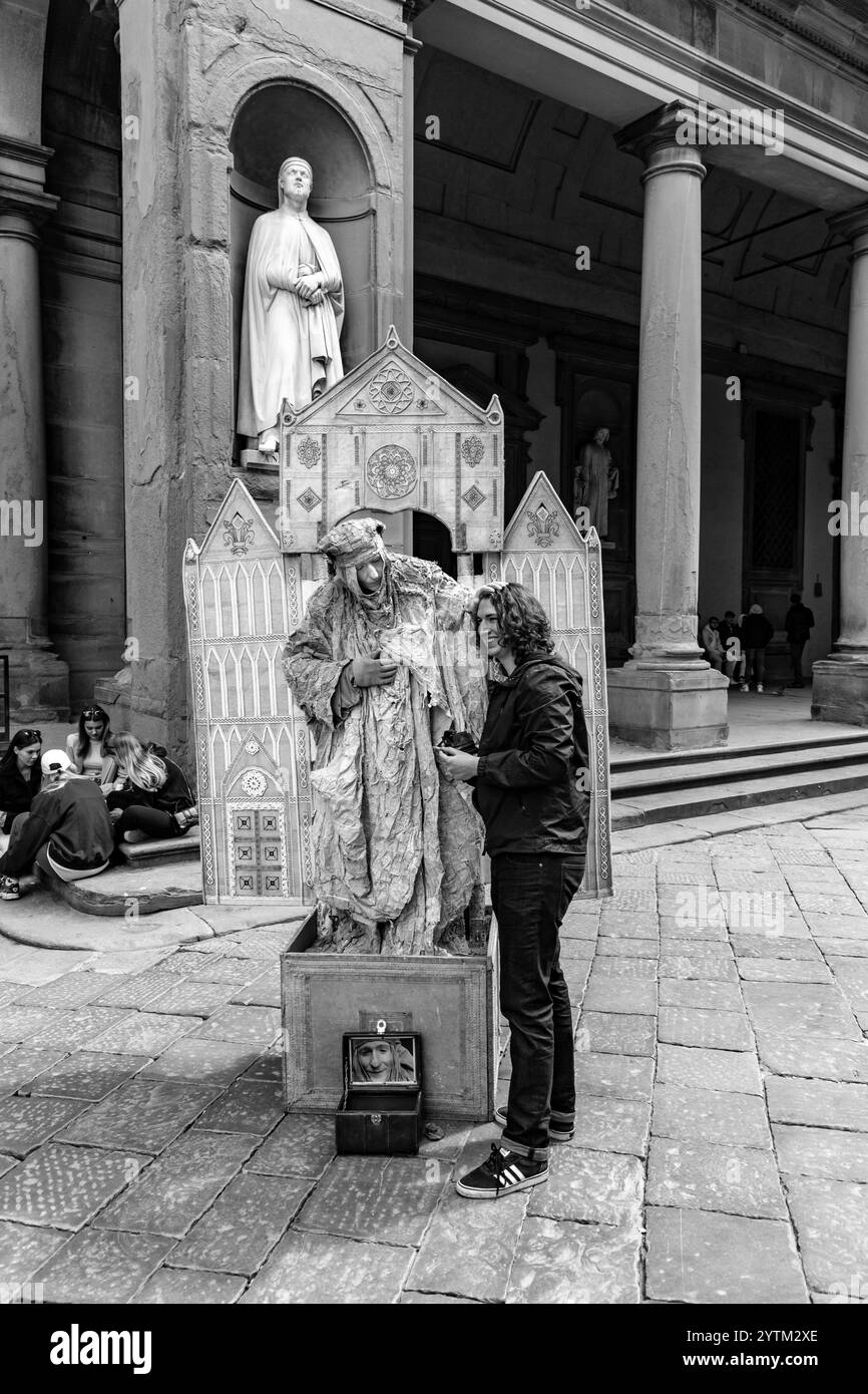 Florence, Italy - April 6, 2022: Mime artist performing in medieval ...