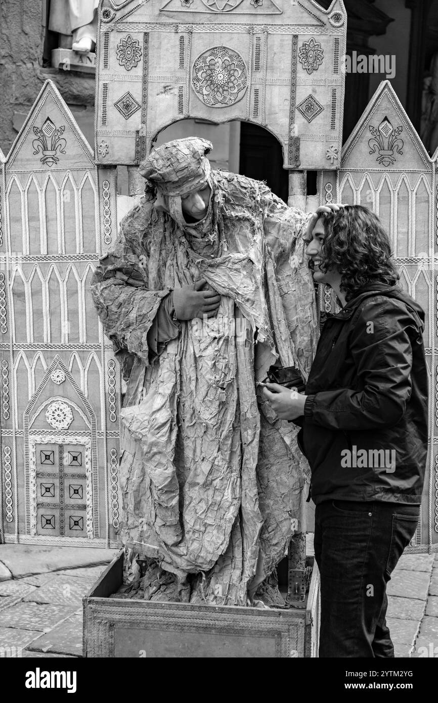 Florence, Italy - April 6, 2022: Mime artist performing in medieval ...
