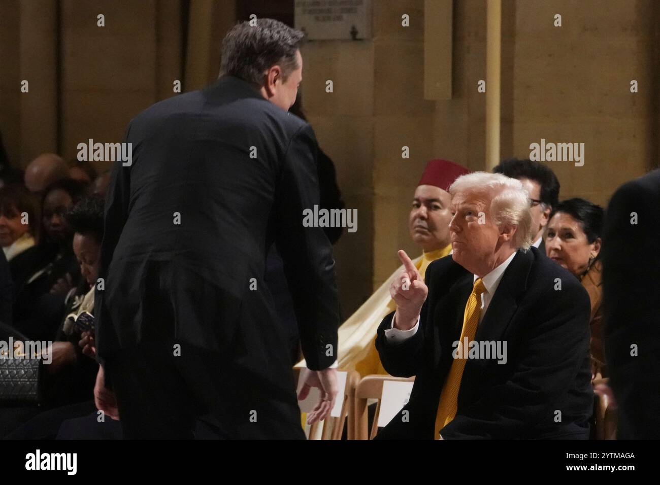 President-elect Donald Trump points to Elon Musk in Notre Dame ...