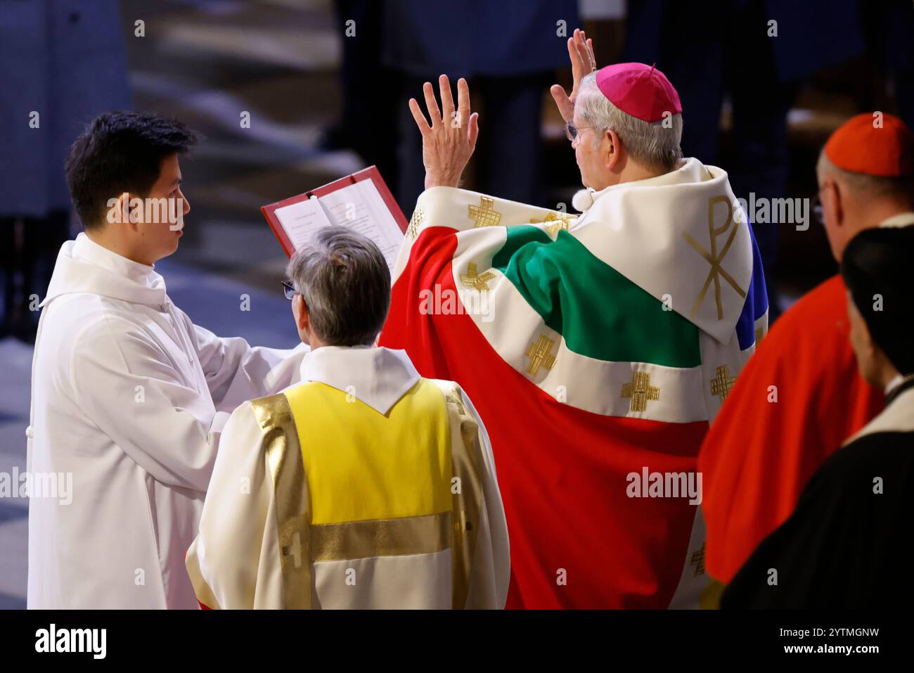 Archbishop of Paris Laurent Ulrich gestures in Notre Dame Cathedral as ...
