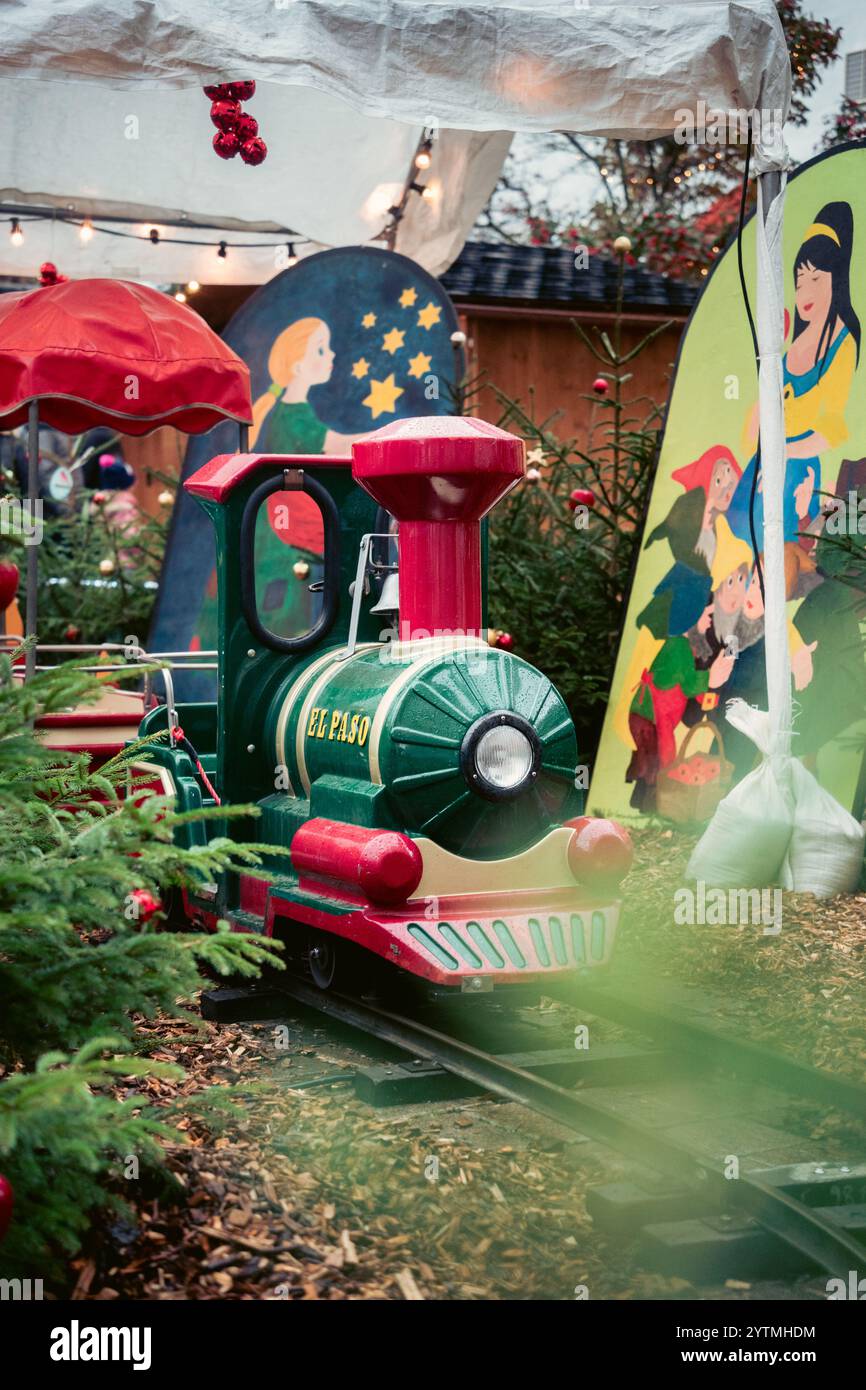 Green Christmas Train with Festive Decorations and Holiday Backdrop ...