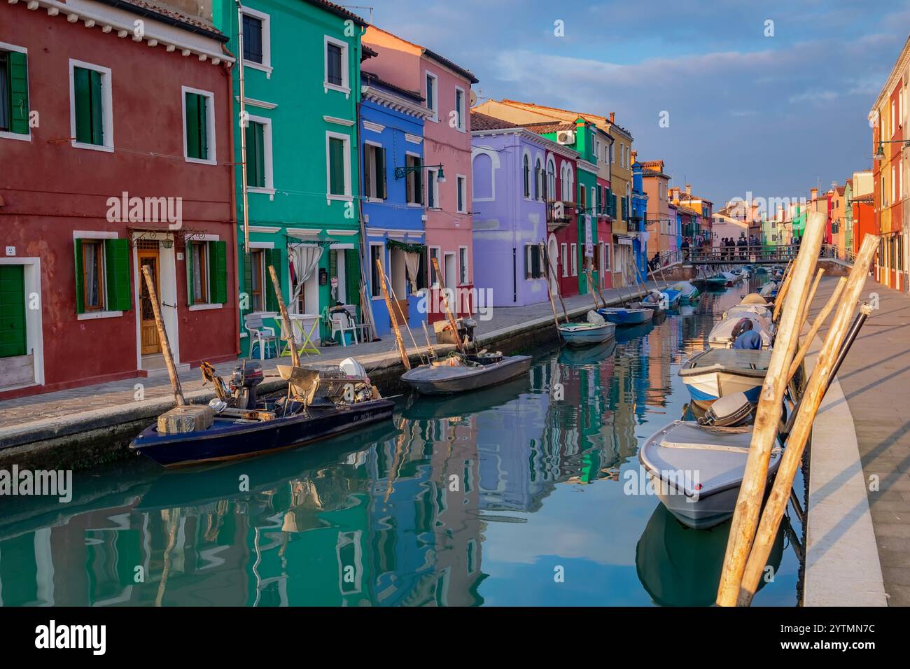 Traditional houses next to a canal in Burano an island in the Lagoon of ...