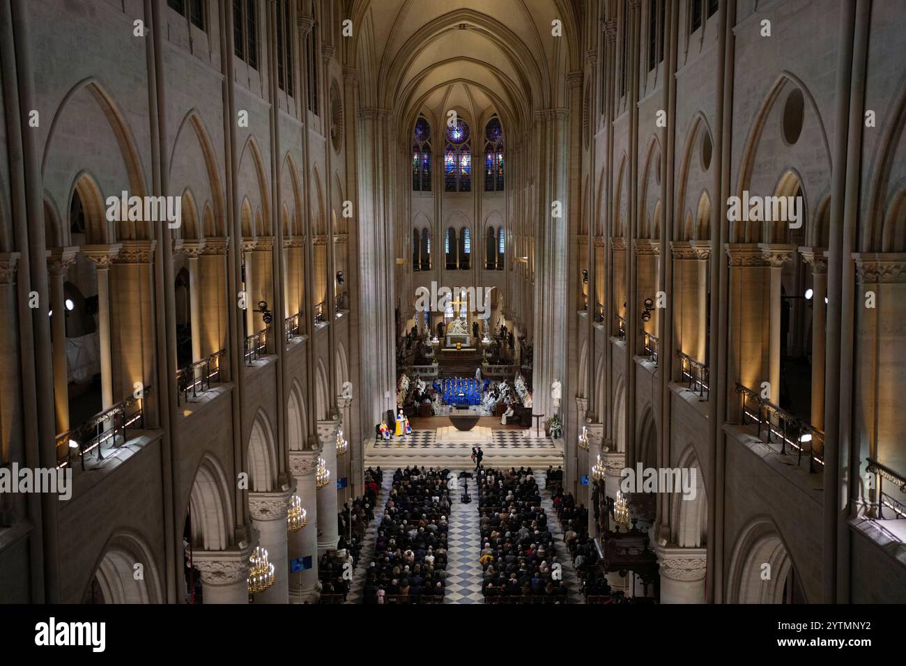 Guest attend the service in Notre Dame Cathedral as France's iconic ...