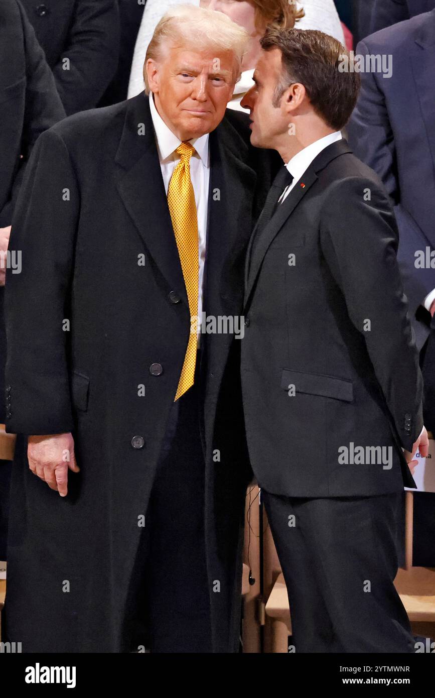 French President Emmanuel Macron talks with US President-elect Donald ...