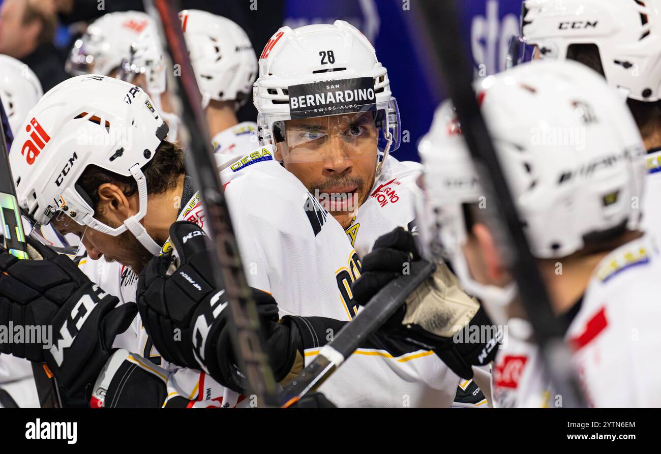 Kloten, Switzerland, 2nd Nov 2024: #28 Samuel Guerra (Lugano) talks to a teammate on the players ...