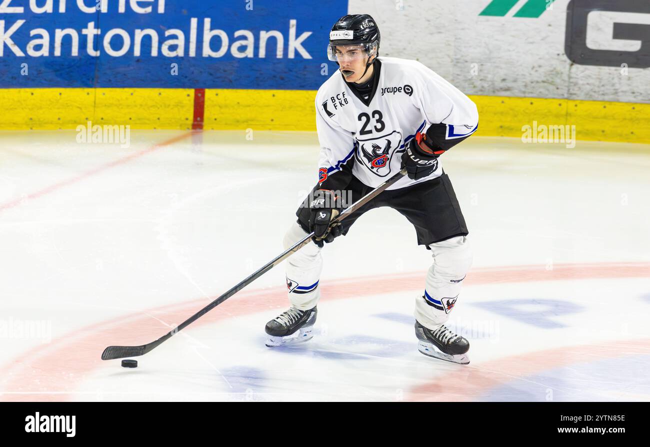 Kloten, Switzerland, 17th Nov 2024: #23 Thibault Martin, defender HC Fribourg-Gotteron Young ...