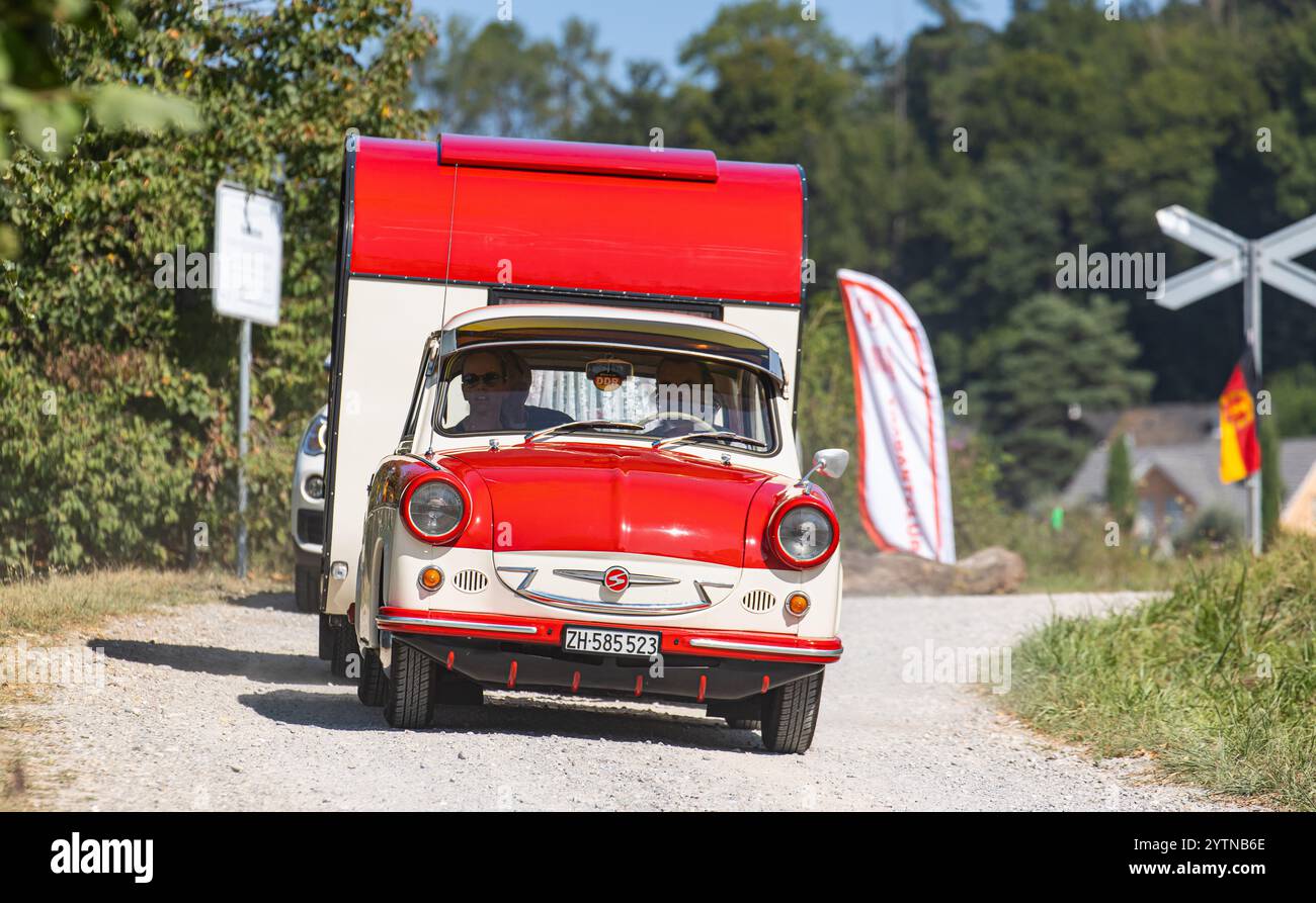 Hüntwangen, Switzerland, 24th Aug 2024: A Trabant 600 limousine pulls a ...