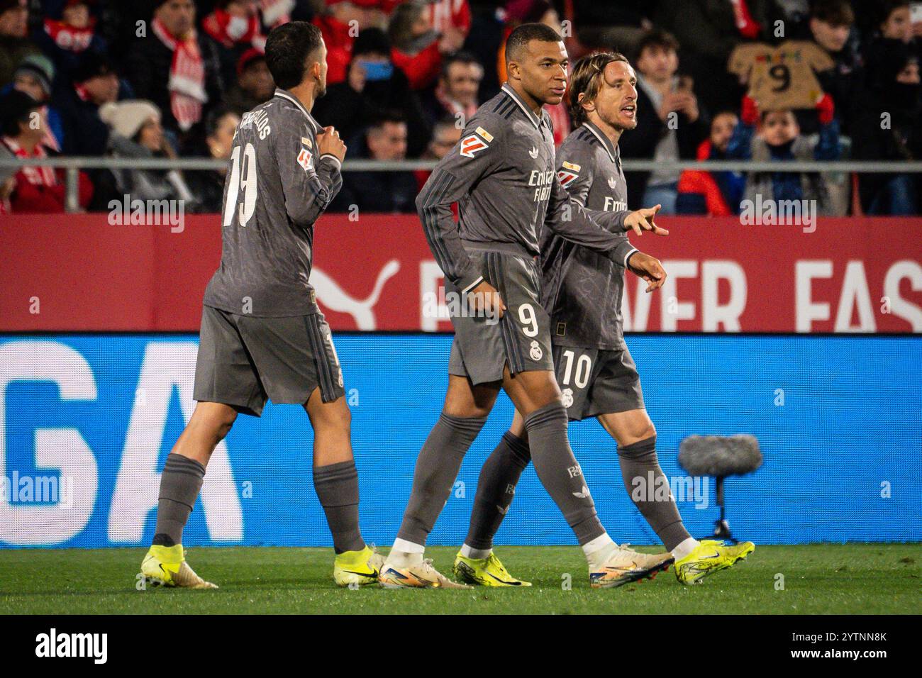 Girona, Espagne. 07th Dec, 2024. Kylian MBAPPE of Real Madrid celebrate his goal with Dani ...