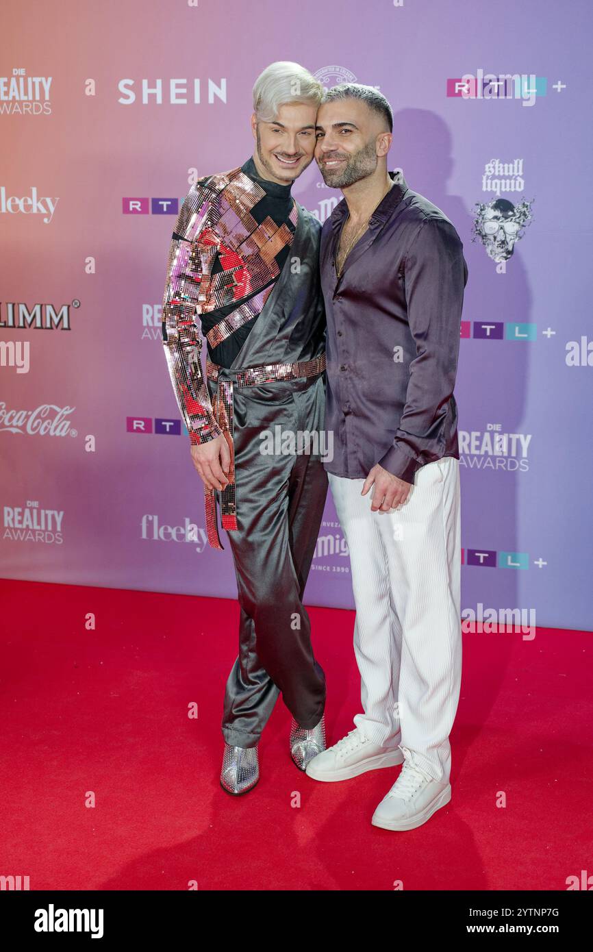 Cologne, Germany. 07th Dec, 2024. Reality stars Sam Dylan (l) and Rafi ...