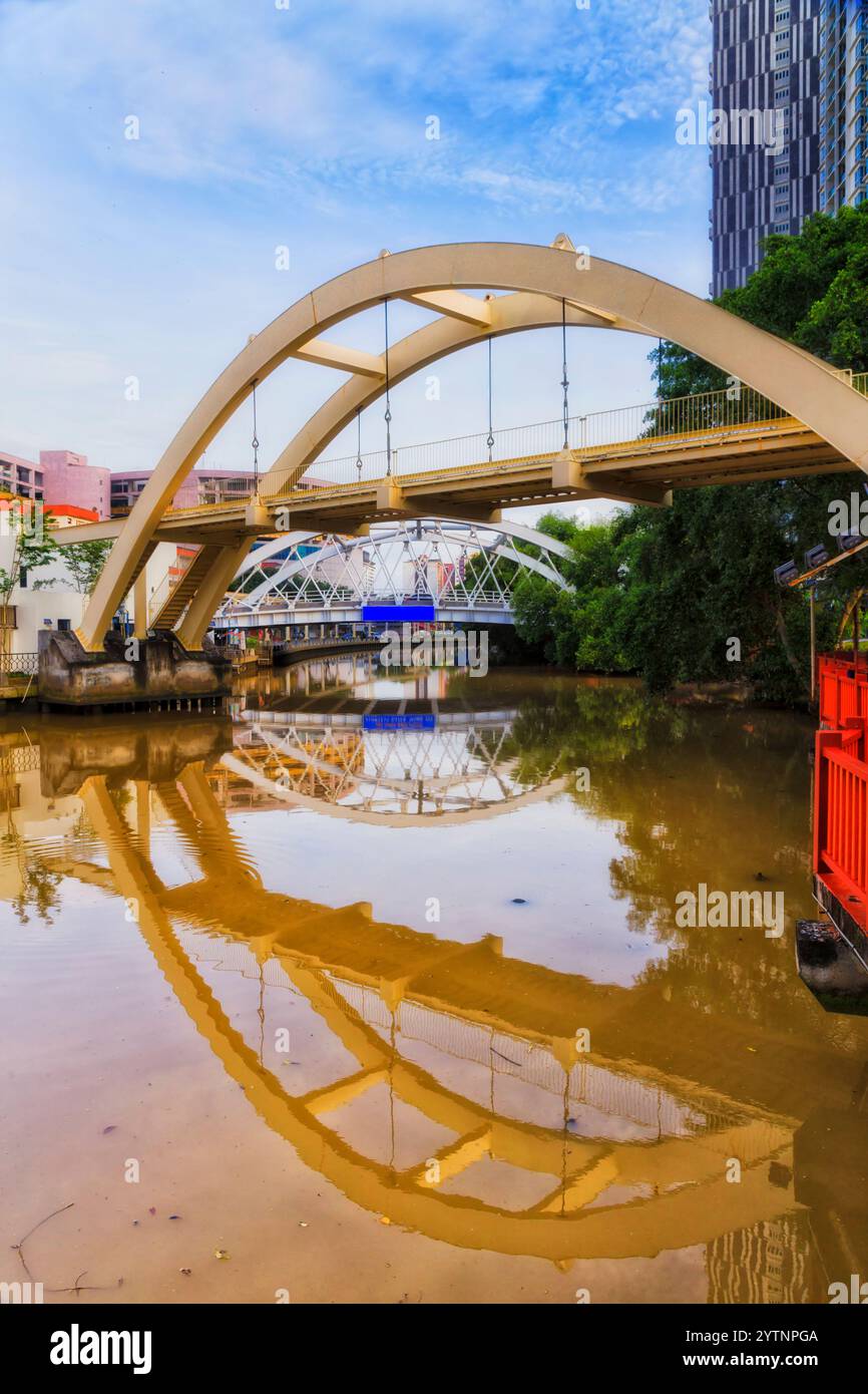 Arches of bridges across Melaka river in Malacca historic town of ...