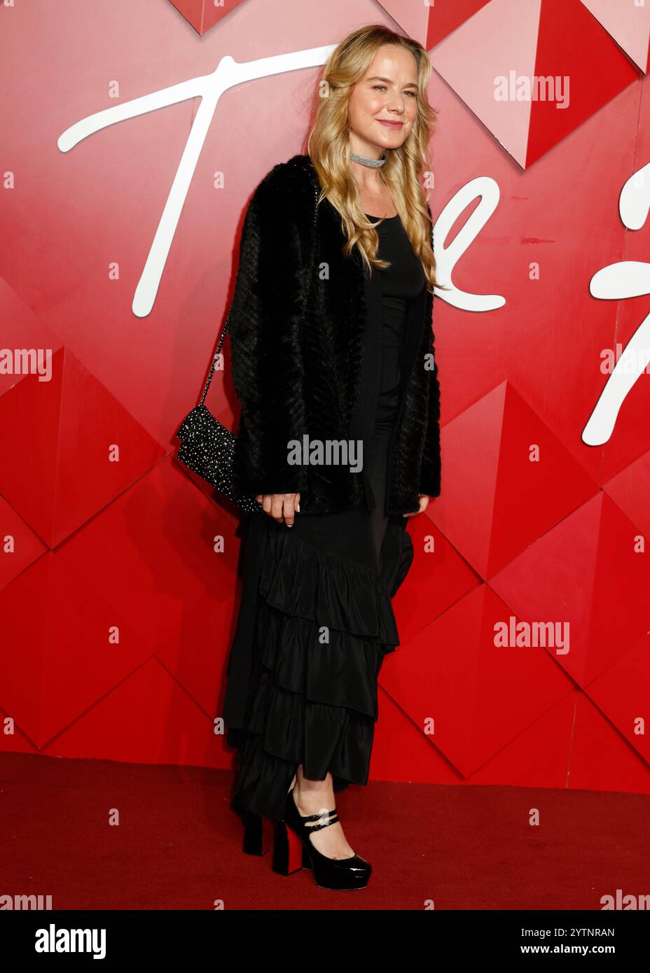 Lily Lewis attends The Fashion Awards 2024 at the Royal Albert Hall in ...