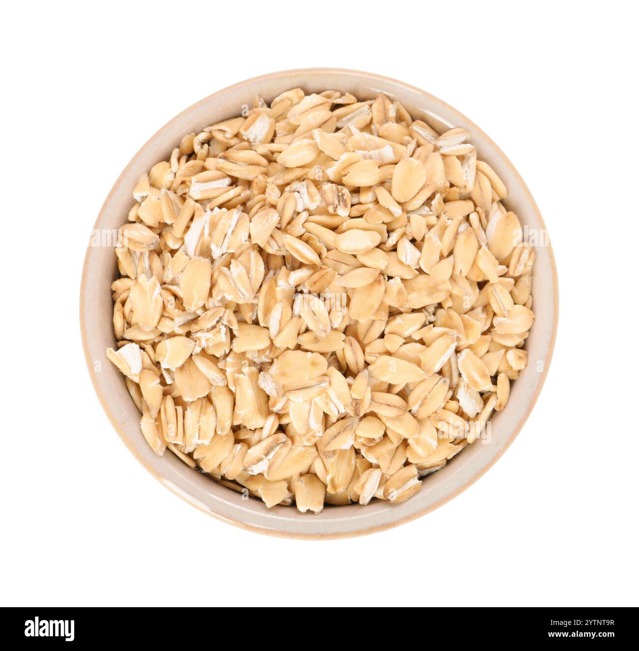 Dry oat flakes in bowl isolated on white, top view Stock Photo - Alamy