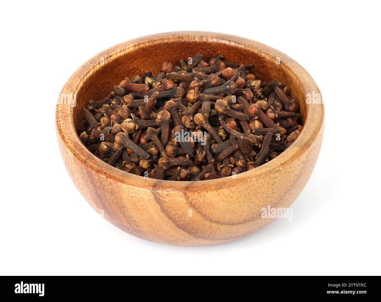 Dry clove buds in wooden bowl on white background. Aromatic spice Stock ...
