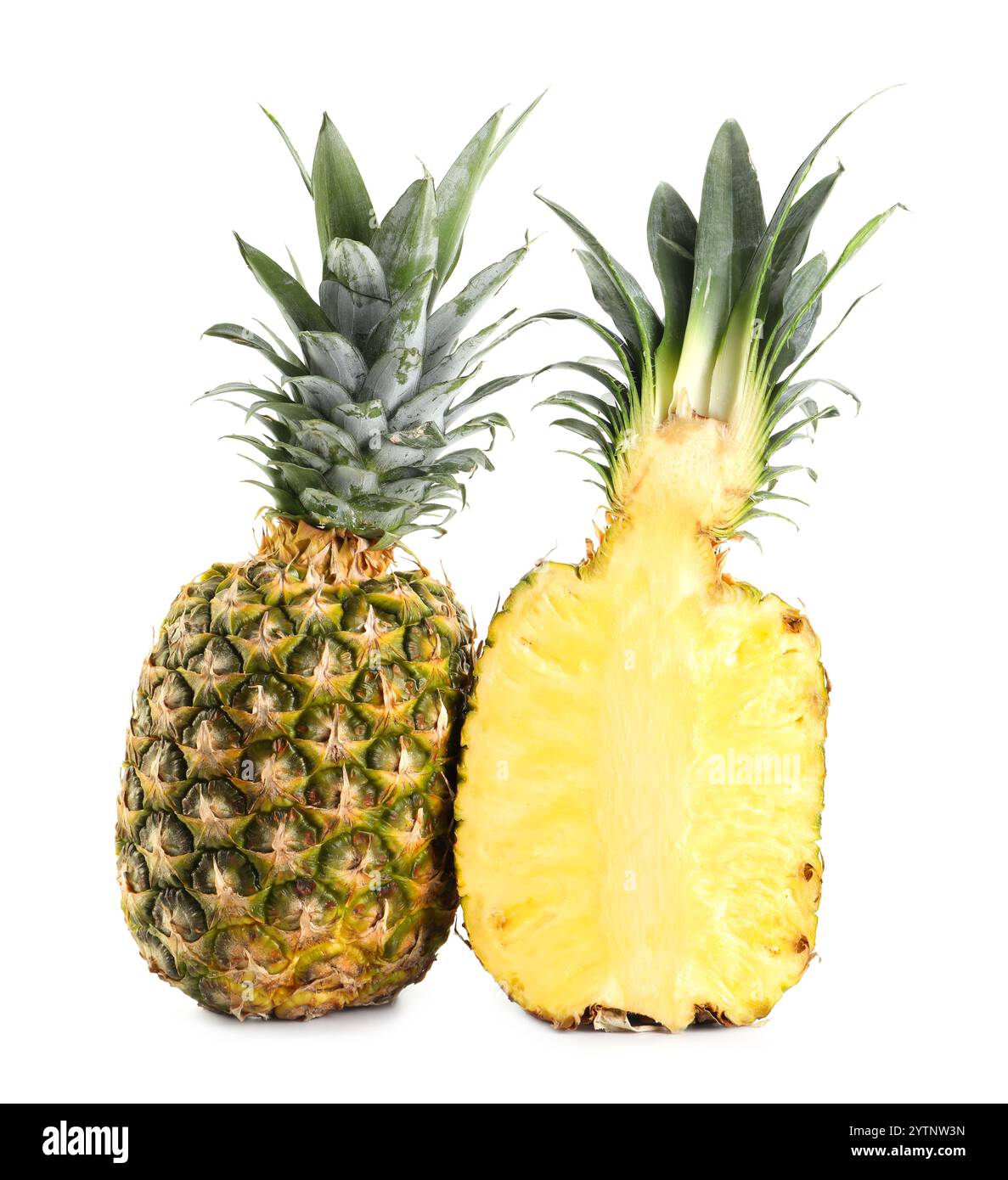 Whole and cut ripe pineapples isolated on white Stock Photo - Alamy
