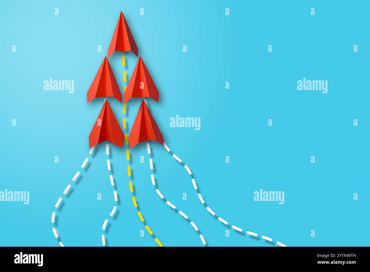 Red paper planes with flight paths on light blue background. Dashed ...