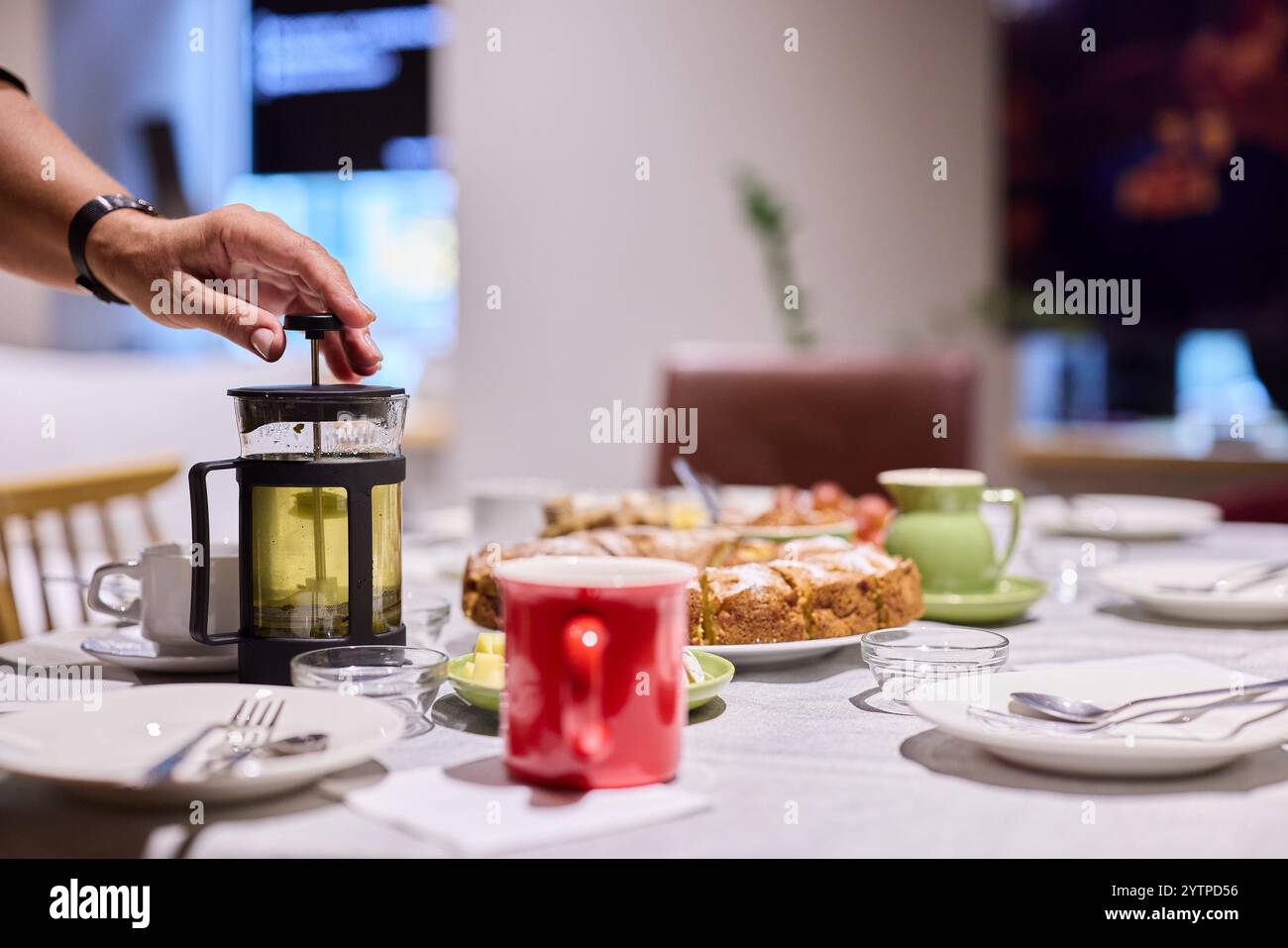 An Elegant Dining Table Setup Featuring Tea and Refreshments for ...