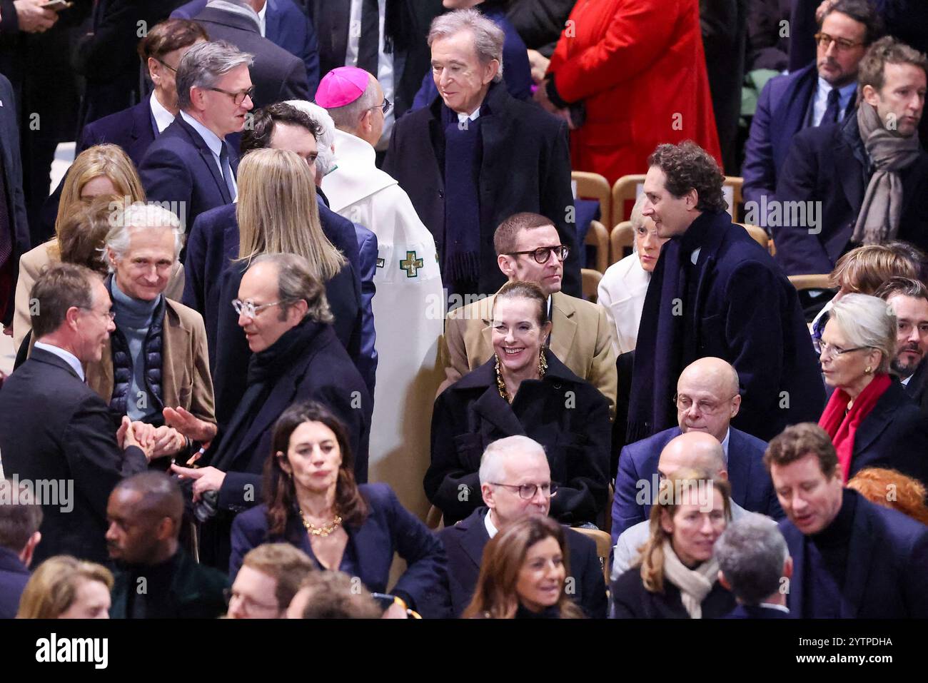 Paris, France. 07th Dec, 2024. Xavier Niel, her husband Delphine ...