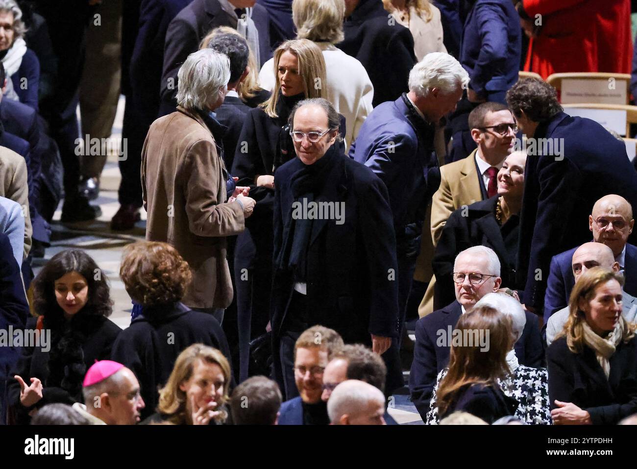 Paris, France. 07th Dec, 2024. Xavier Niel, his wife Delphine Arnault ...