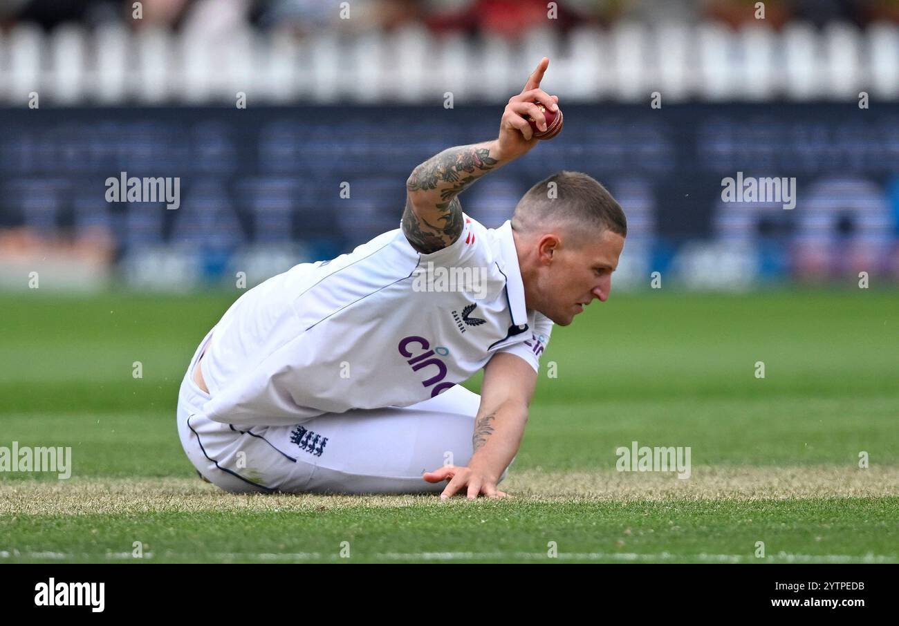 England bowler Brydon Carse takes a catch to dismiss New Zealand's Tom ...