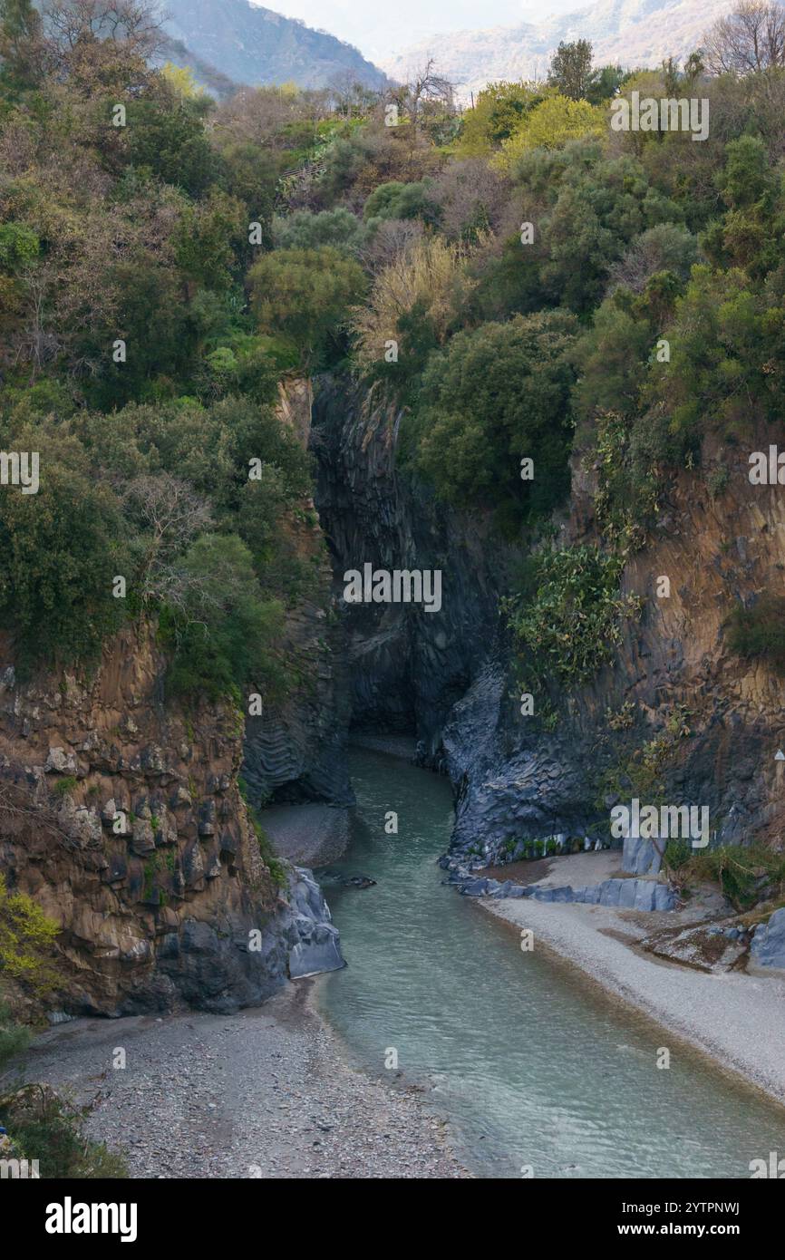 Gole dell Alcantara gorge formed by basalt columns with river near to ...