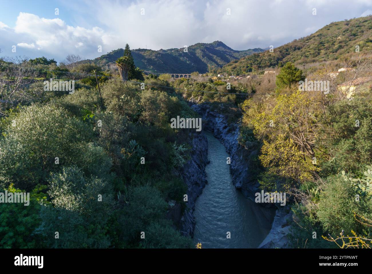 Gole dell Alcantara gorge formed by basalt columns with river near to ...
