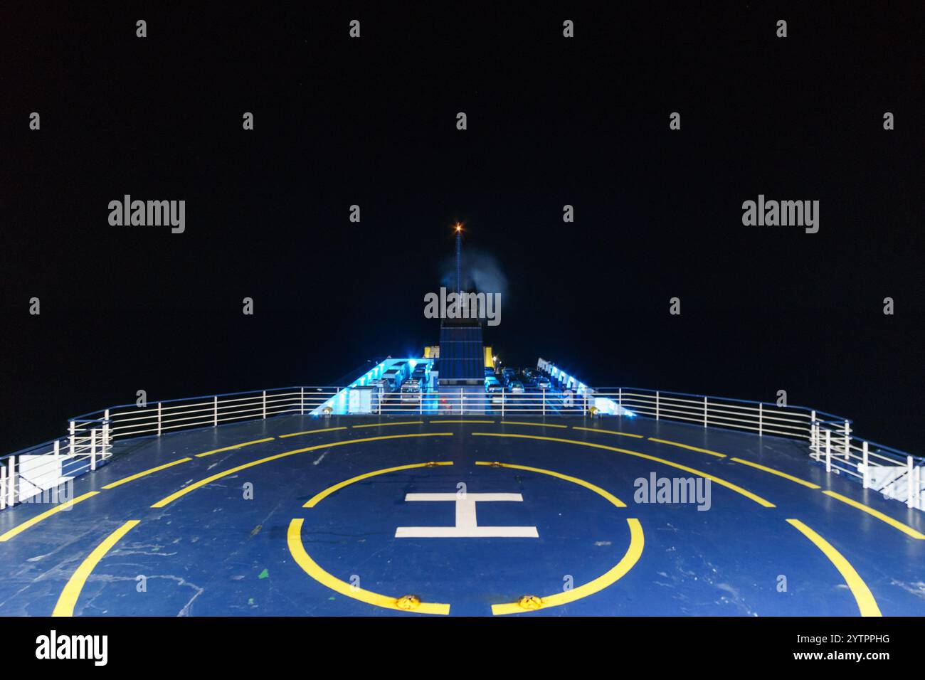 Yellow sign of helipad for helicopters at car ferry boat on open deck ...