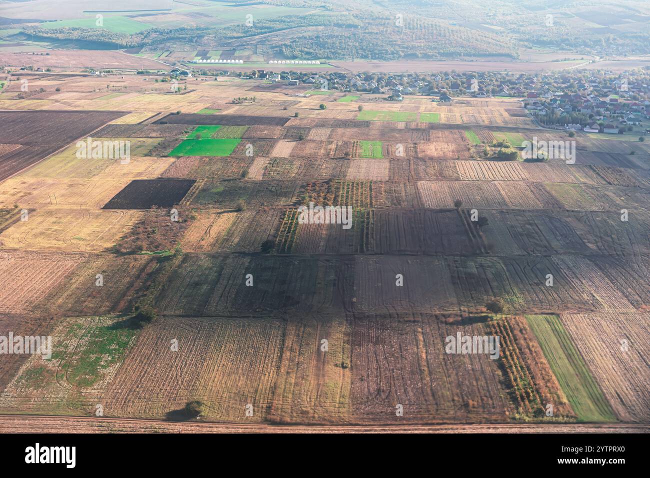 Aerial view of patchwork of agricultural fields, each indicating ...