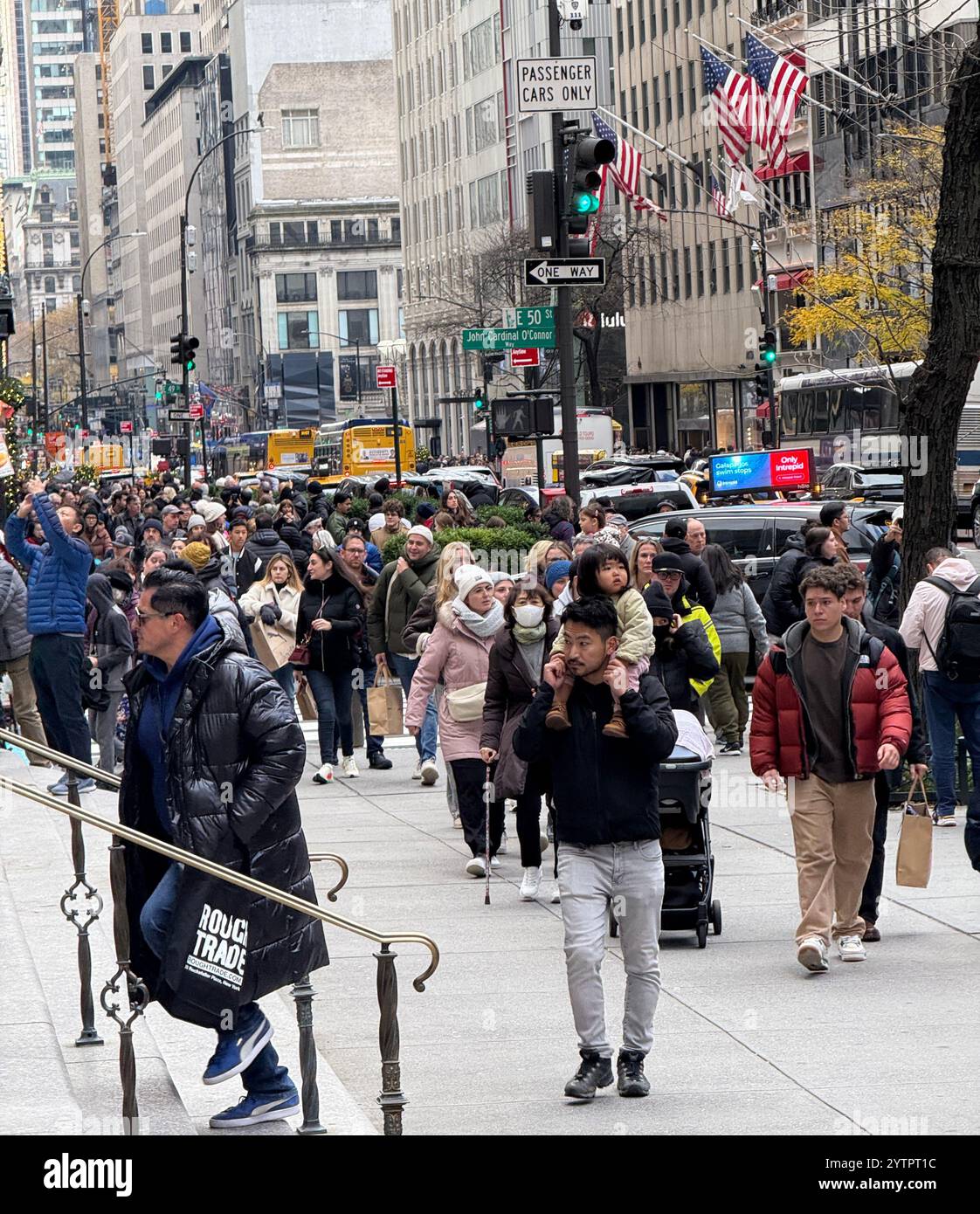 Crowds of people out on Black Friday by Rockefeller Center on 5th ...