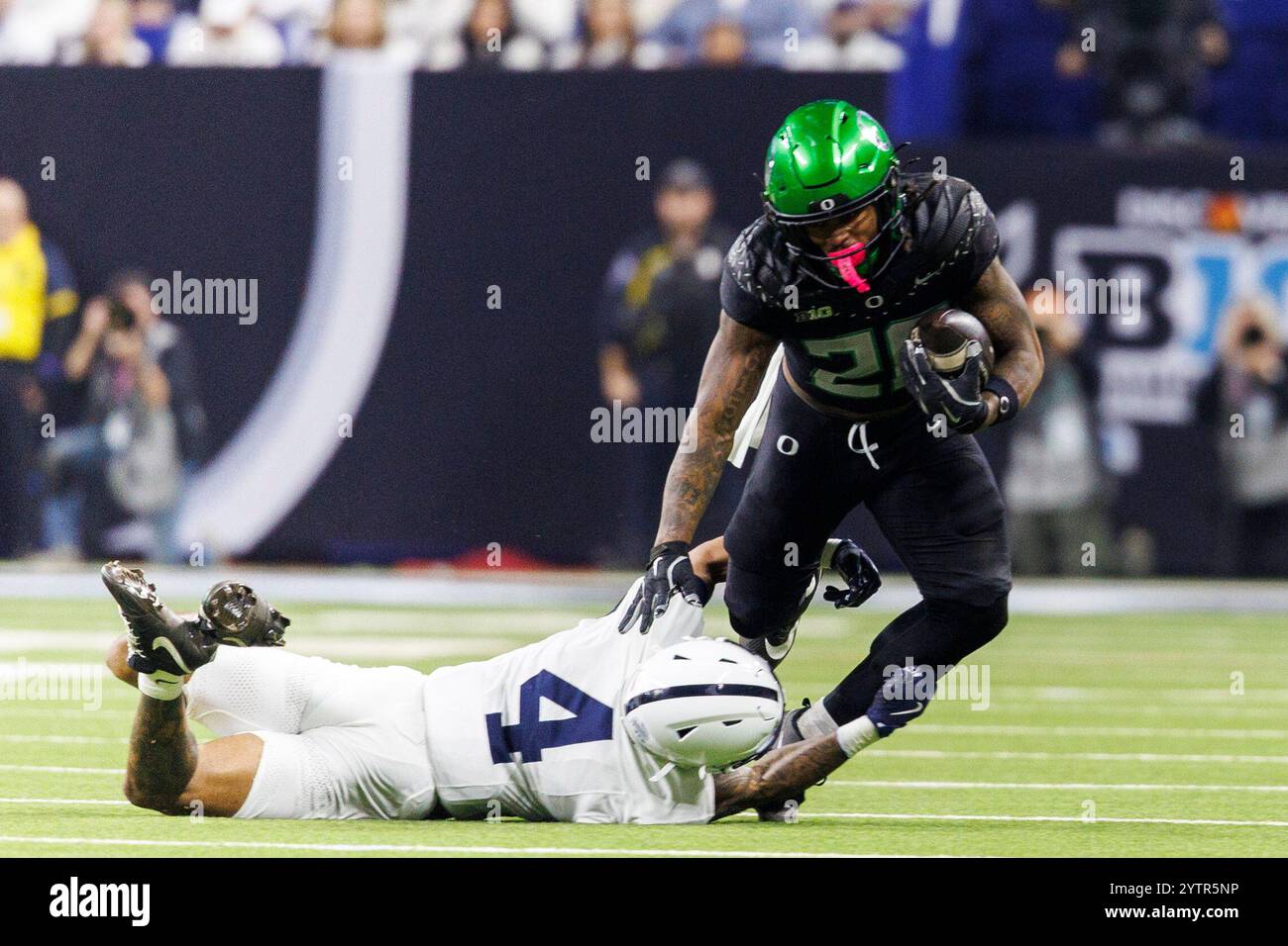 December 07, 2024: Oregon running back Jordan James (20) runs with the ...