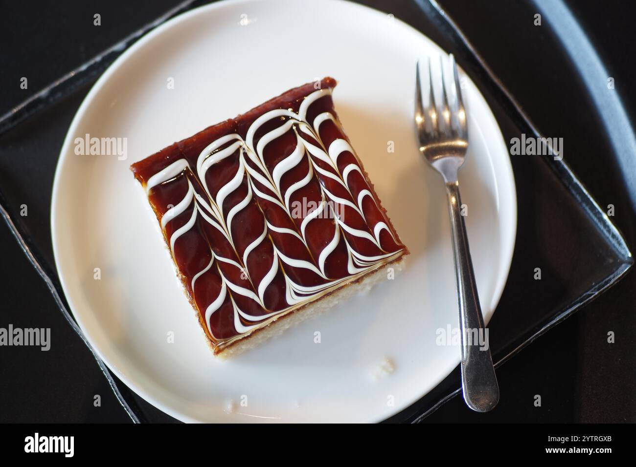 Delicious Layered Cake with a beautifully Decorative Frosting Design ...