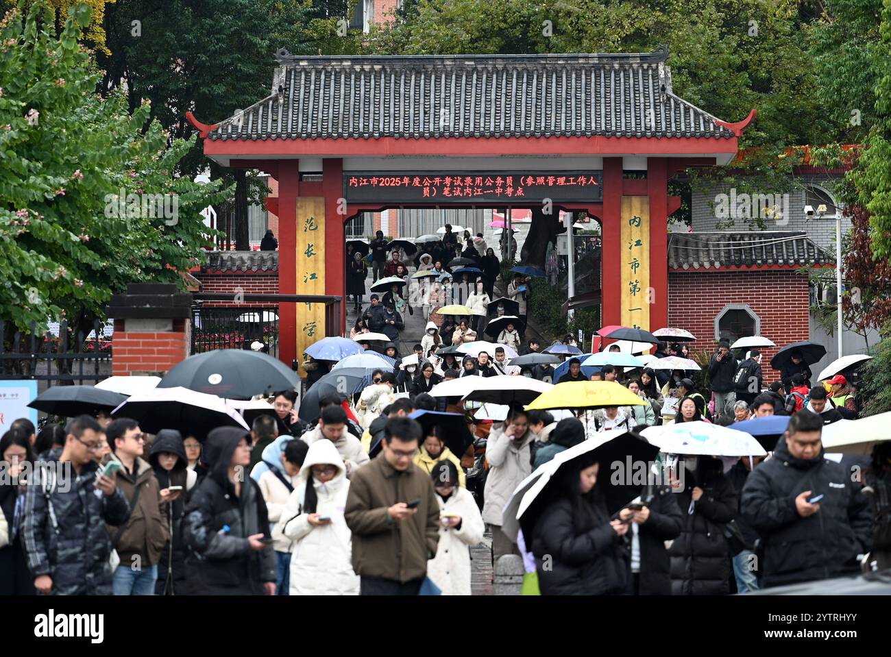 NEIJIANG, CHINA - DECEMBER 8, 2024 - Reference personnel walk out of ...