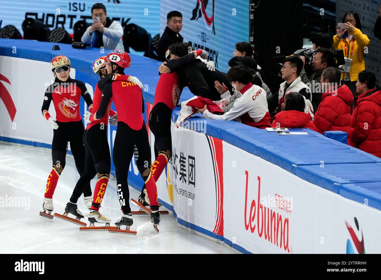 The members of Chinese team celebrate after winning in the Mixed Team ...