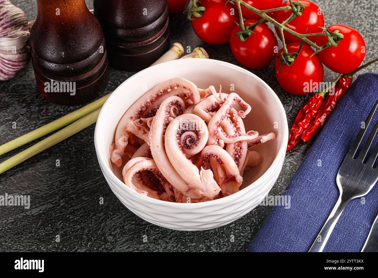 Delicous marinated squid tentacles snack in the bowl Stock Photo - Alamy