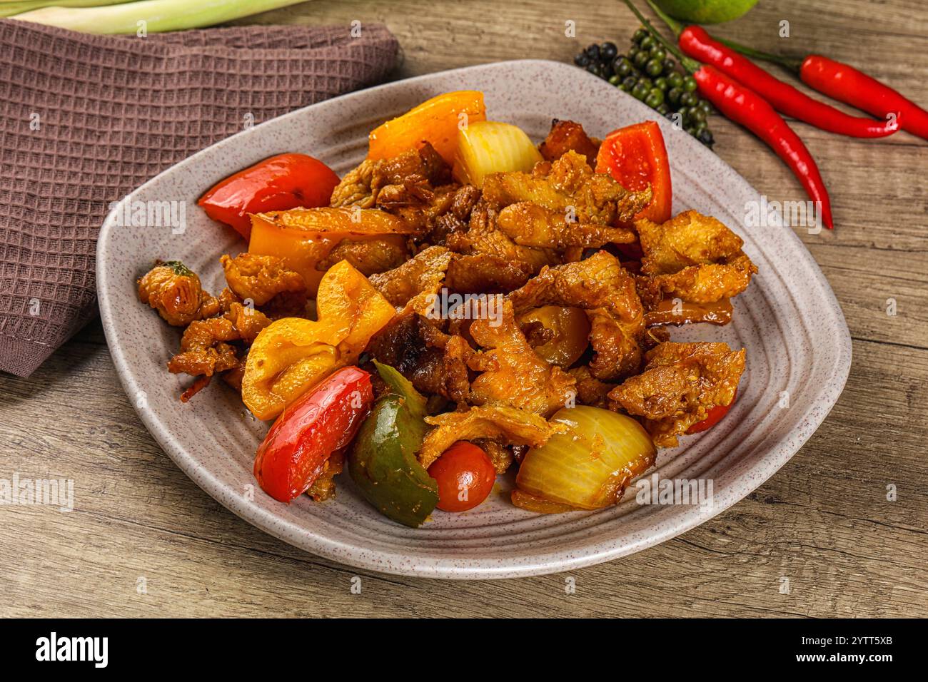 Asian cuisine - roasted crocodile meat with vegetables Stock Photo - Alamy