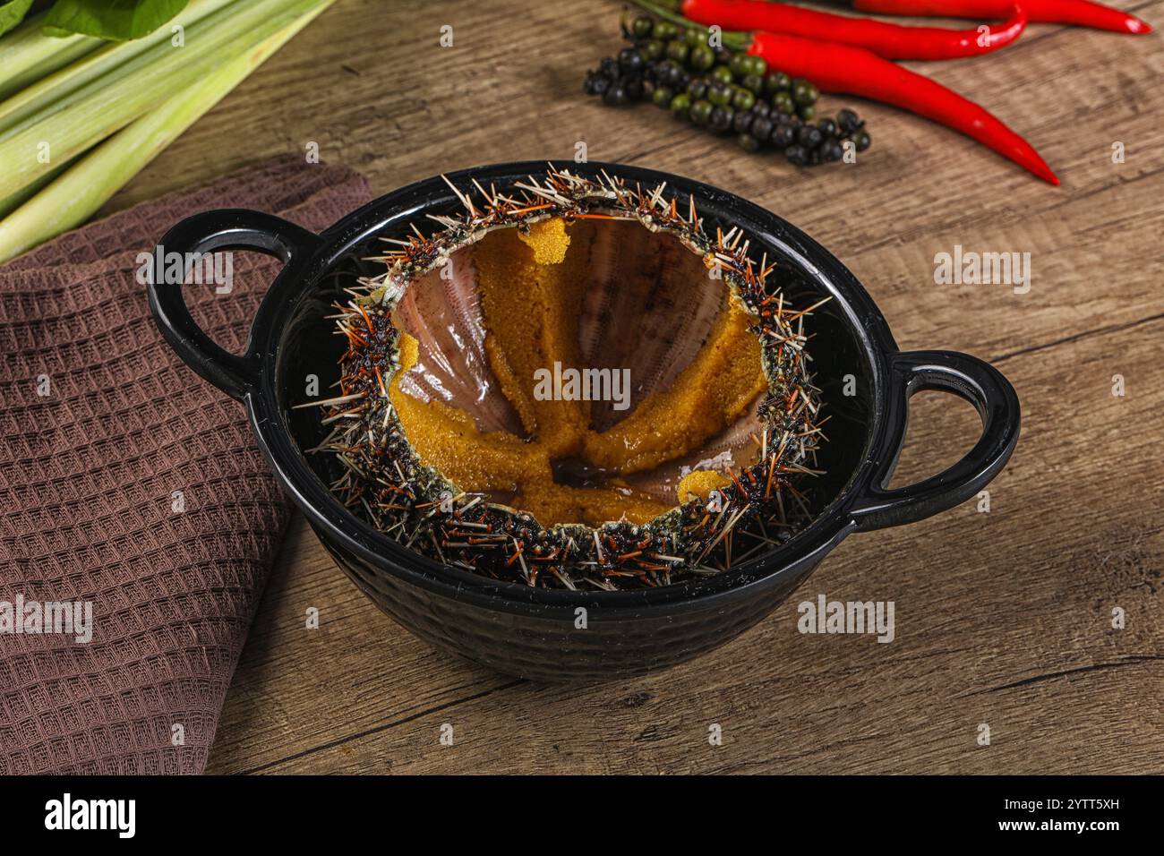 Delicous luxury raw sea urchin delicatessen Stock Photo - Alamy