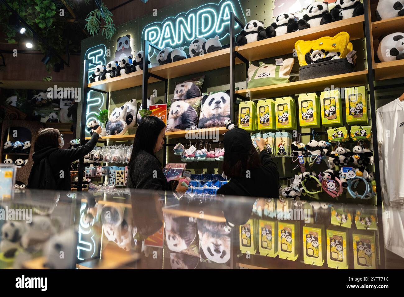 Panda souvenirs are displayed at a shop as the Beijing-gifted giant panda An An and Ke Ke make ...