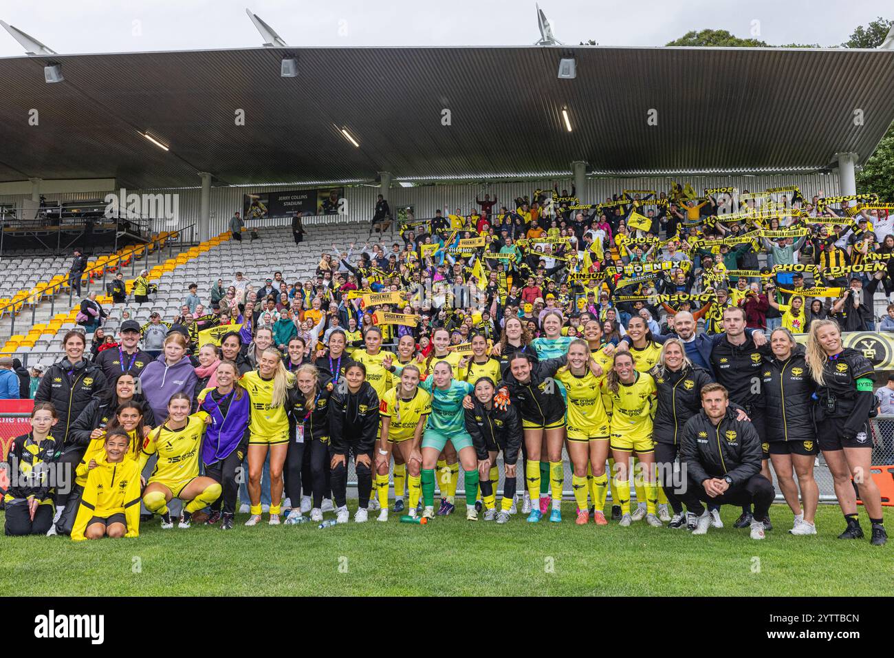 Wellington, New Zealand. 8th Dec 2024. The Wellington Phoenix players and coaching staff pose ...