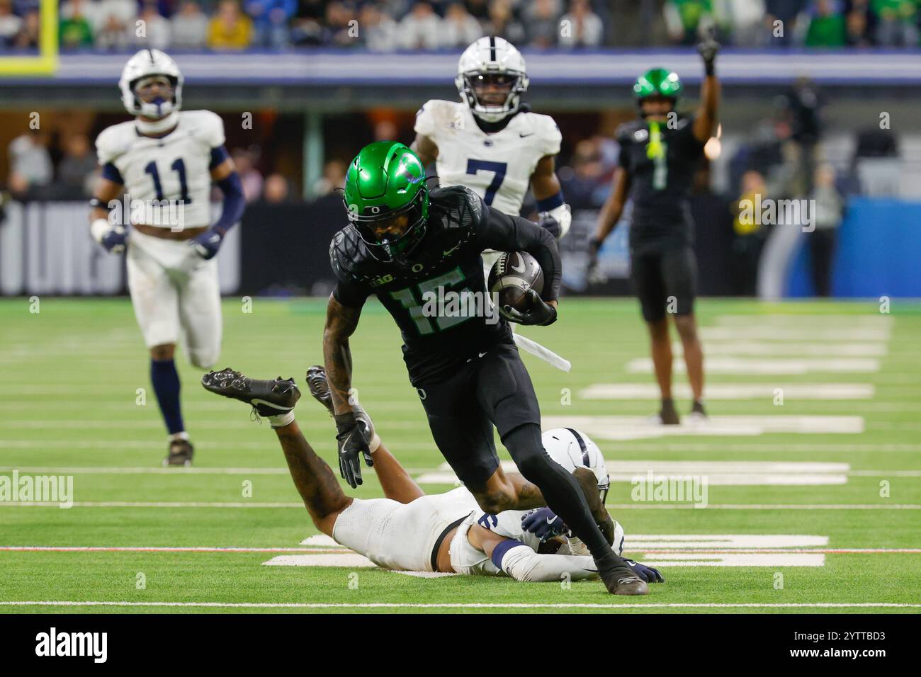 December 7, 2024: Oregon Ducks wide receiver Tez Johnson (15) scores on ...