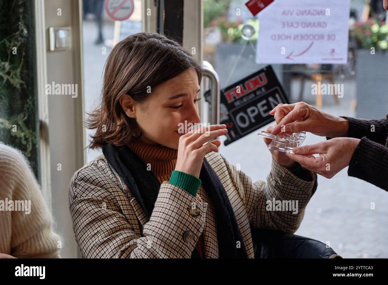 People trying the Chocolate Shooter created by Dominique Persoone for ...