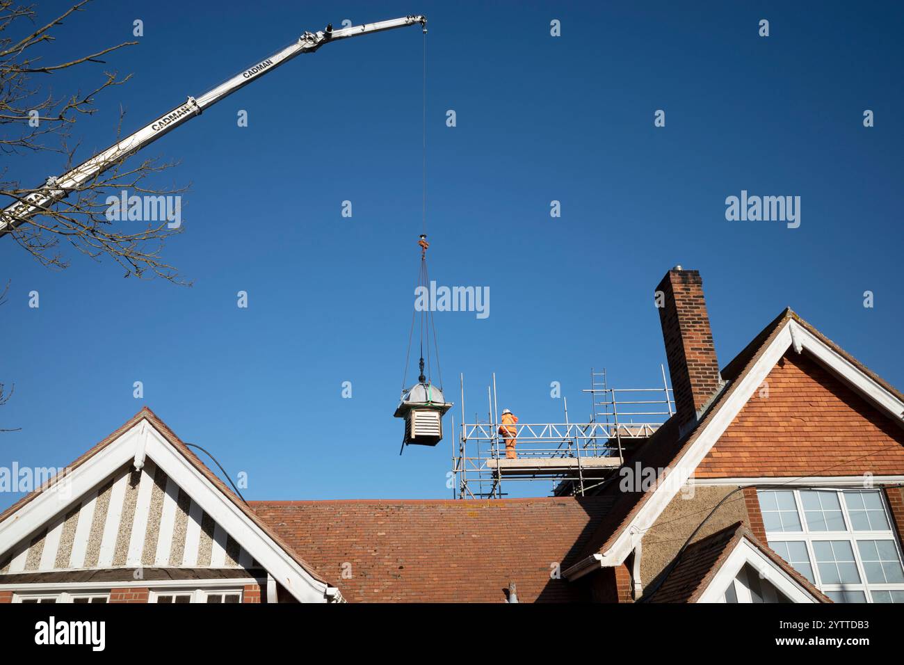 Wooden turret on a school being removed for repair hi-res stock ...