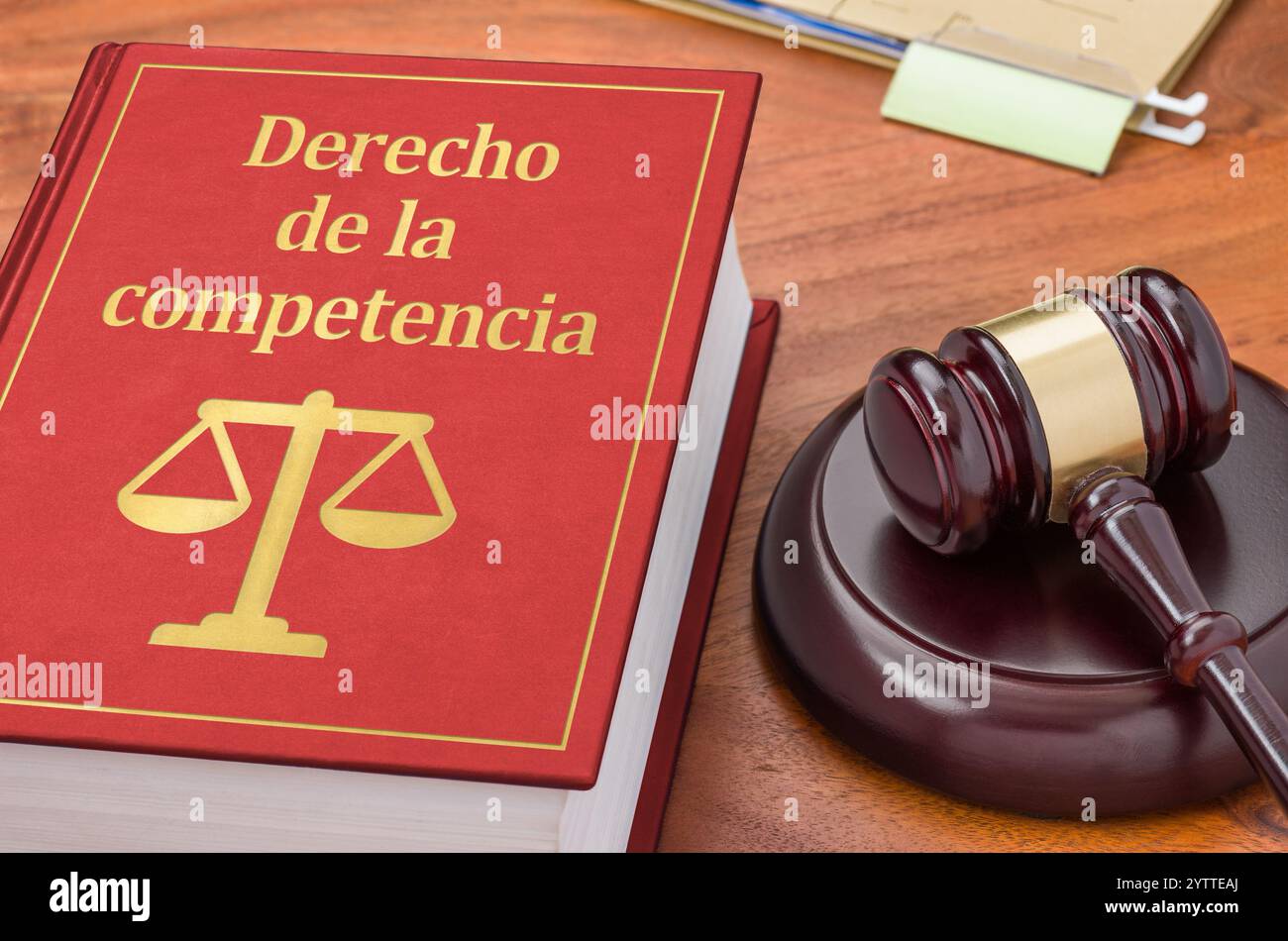 A law book with a gavel - Competition law in spanish Stock Photo - Alamy