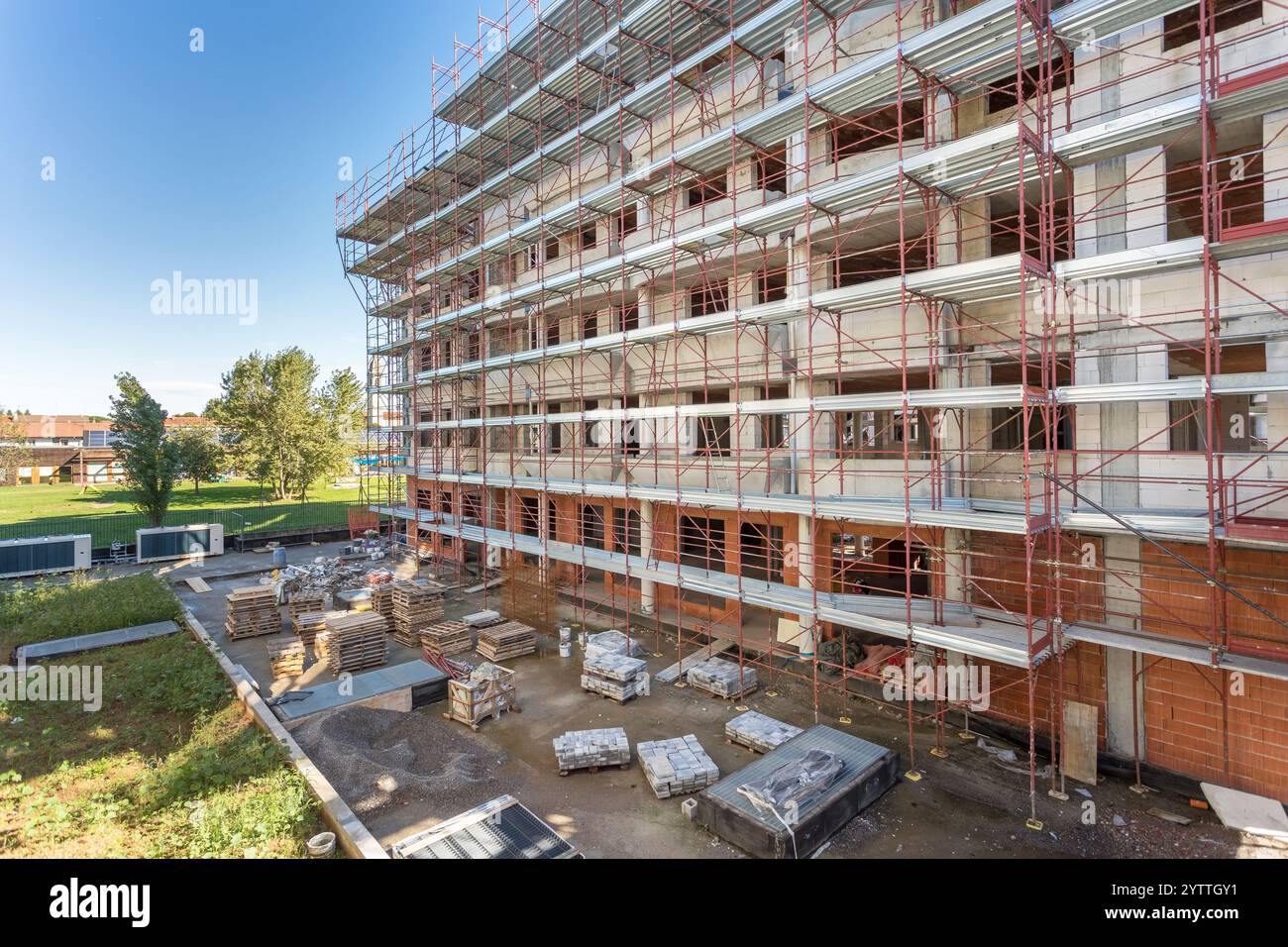 Construction residential new house in progress at building site housing ...