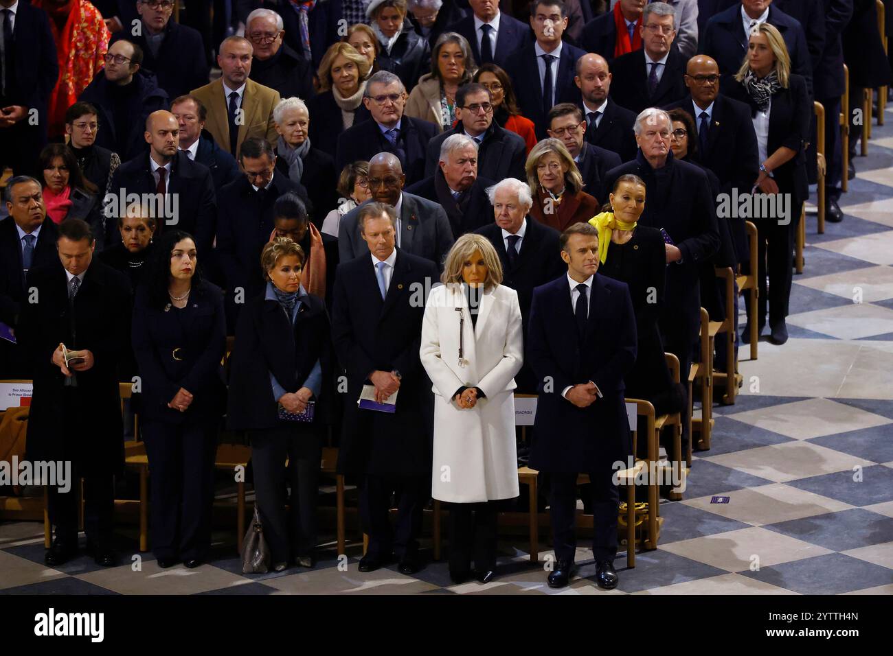 Front row from right, French President Emmanuel Macron, his wife ...