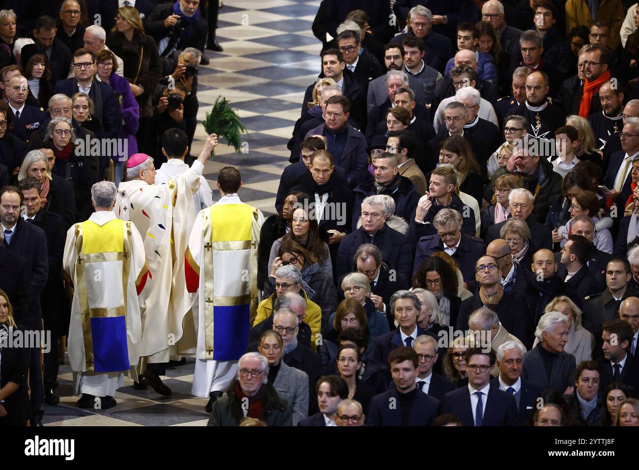 Archbishop Laurent Ulrich delivers his blessing during an inaugural ...